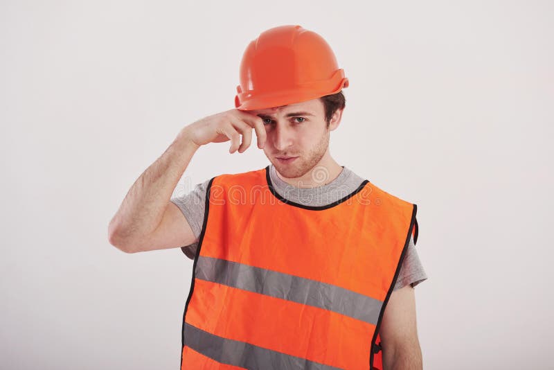 Safety First. Man in Orange Colored Uniform Stands Against White ...