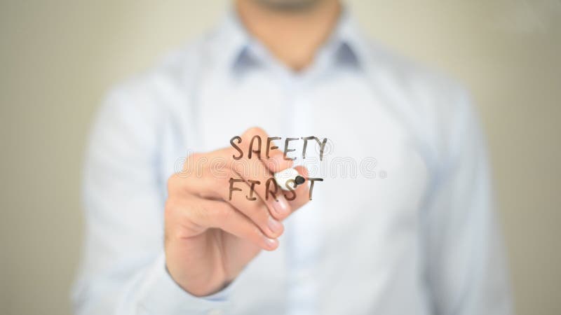 Safety First, Man Writing on Transparent Screen Stock Image - Image of ...