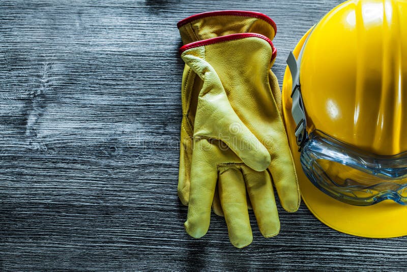 Safety Glasses Leather Gloves Hard Hat On Vintage Wooden Board Stock Image Image Of Industrial