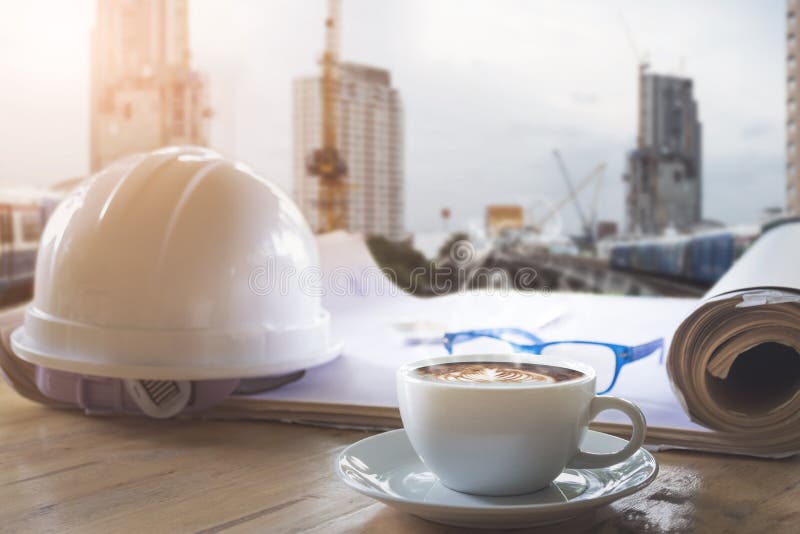 Safety Helmet Blue Print Plan And Cup Of Coffee On Engineer Work Stock ...