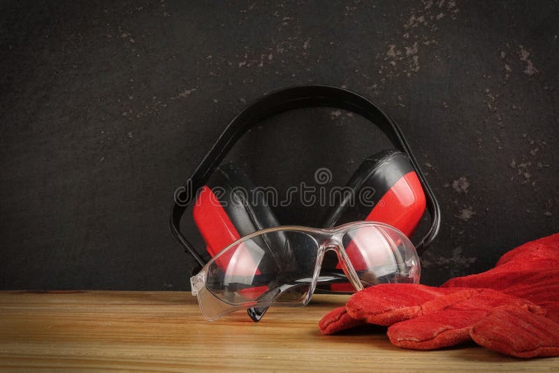 Safety Personal Protective EquipmentPPE on a Rustic Black Background ...