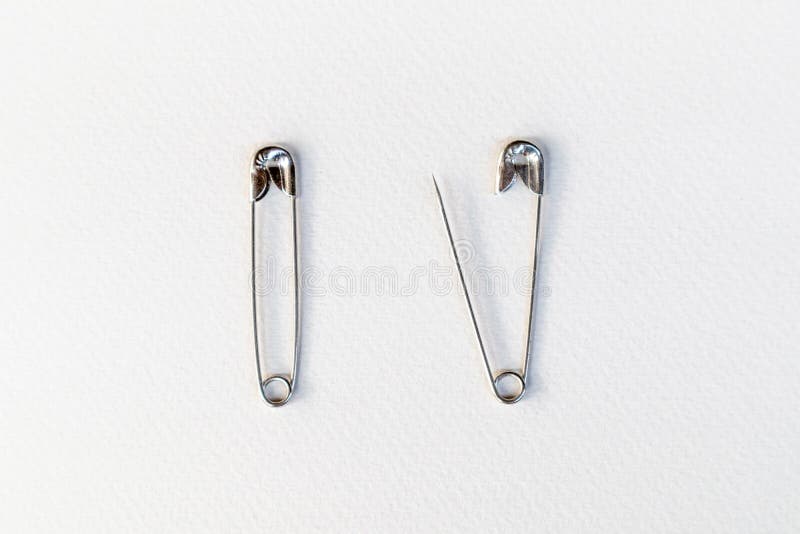 Safety Pin Made of Stainless Steel on a White Background. Stock Image ...
