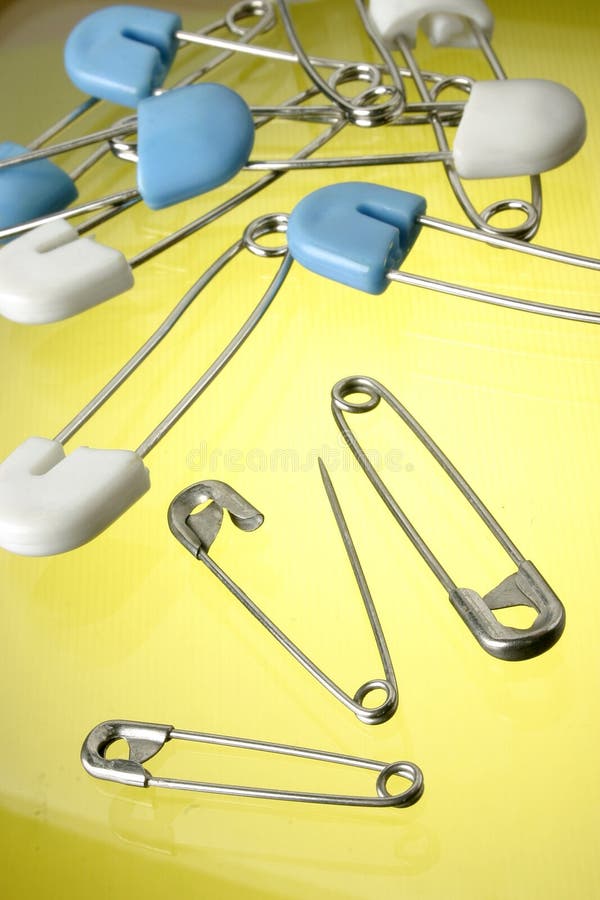 Safety pins in red stock photo. Image of shape, clip, abstract - 58396