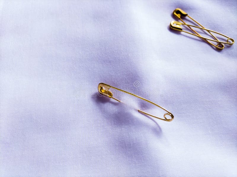 Safety Pins on White Background Stock Photo - Image of metal, texture ...