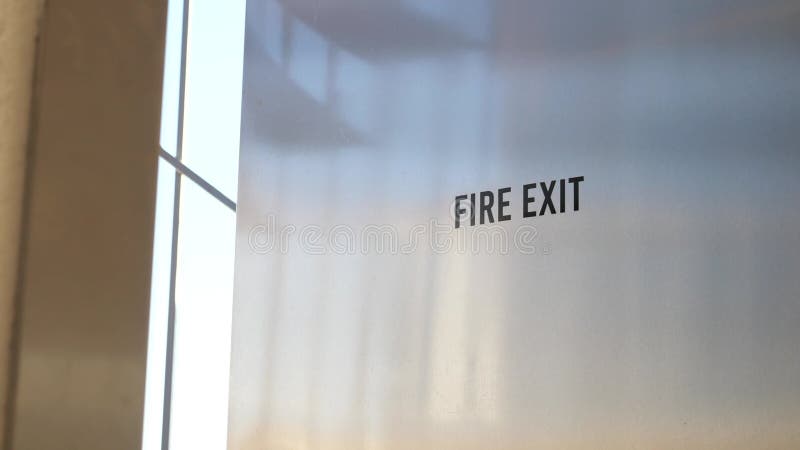 Safety Protocol Signage Near Exit in Commercial Building Stock Video ...