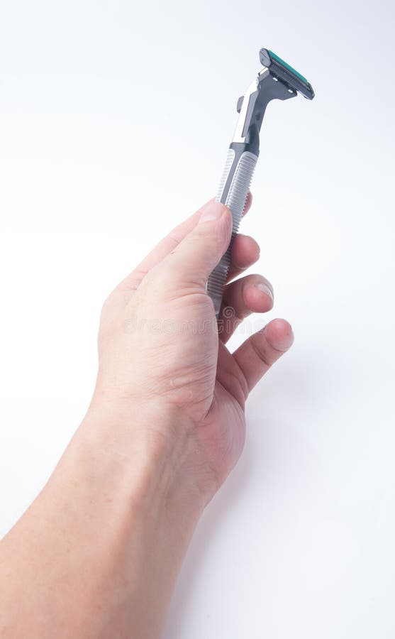 Safety Shaver or Razor in Hand Stock Photo - Image of body, shaver ...