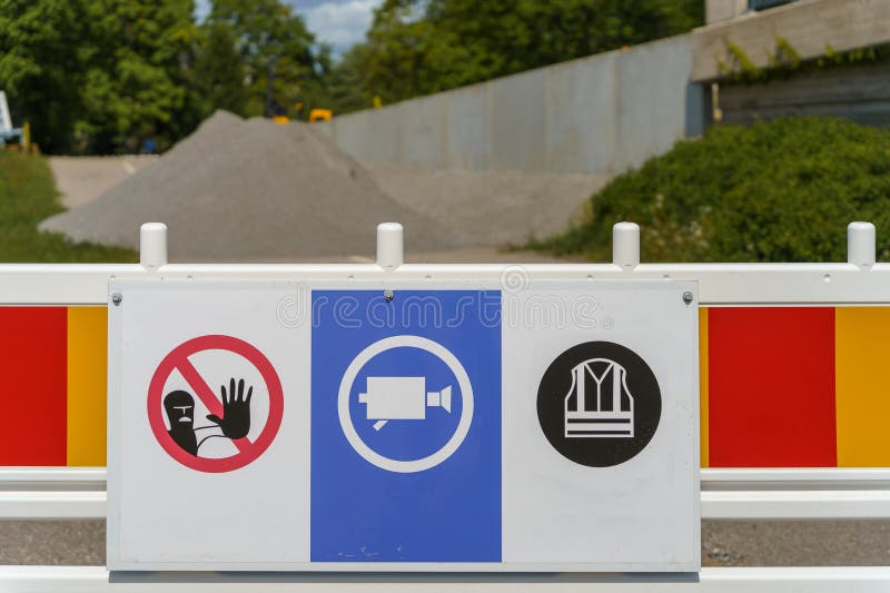 Safety Signs on a Construction Barrier in a Work Site Stock Photo ...