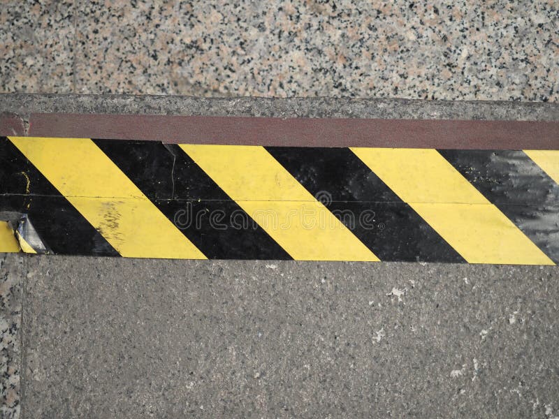 Safety tape on a step stock image. Image of black, tape - 286079487