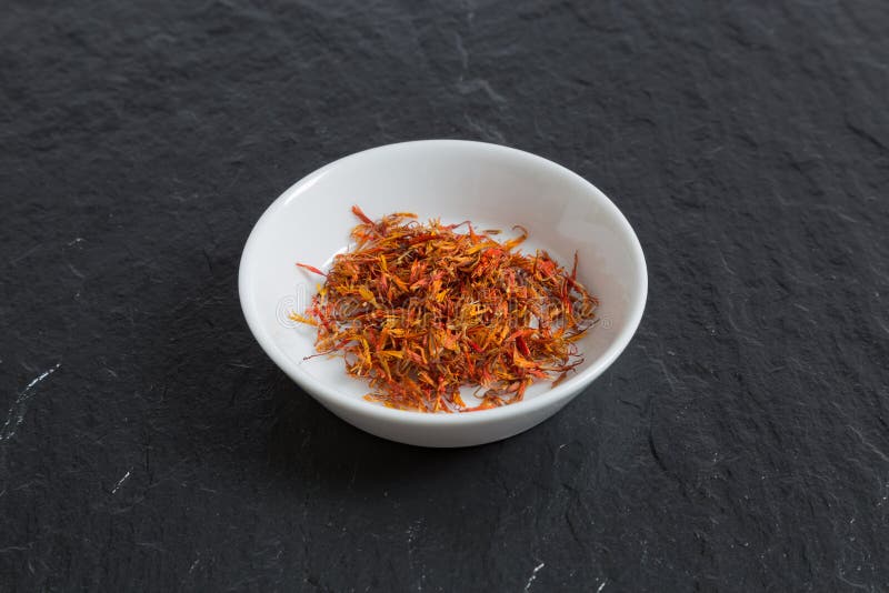 Saffron in a Bowl on a Slate Stock Image - Image of ingredient, spice ...