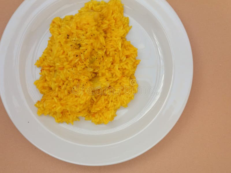 Saffron risotto in a dish stock photo. Image of carnaroli - 79014016