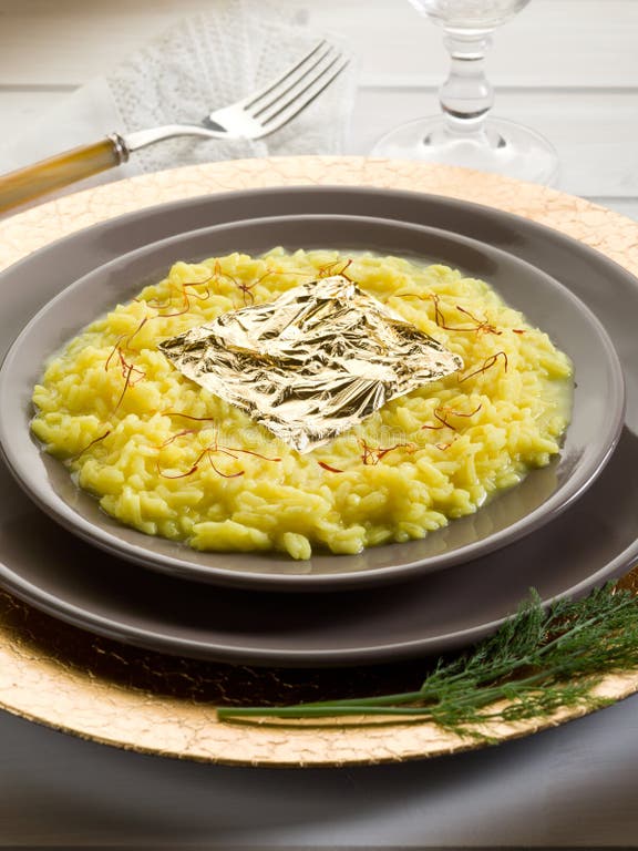 Saffron Risotto with Gold Leaf Stock Photo - Image of flower, savory ...