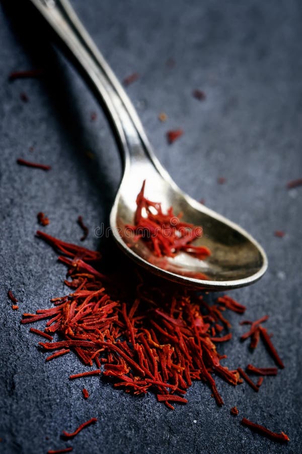 Saffron in a Spoon on a Dark Background, Selective Focus, Macro Stock ...