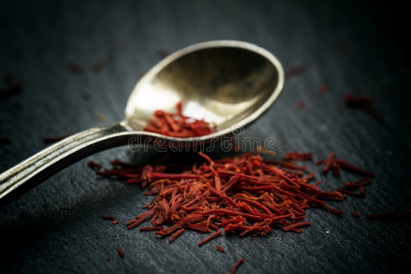 Saffron in a Spoon on a Dark Background, Selective Focus, Macro Stock ...
