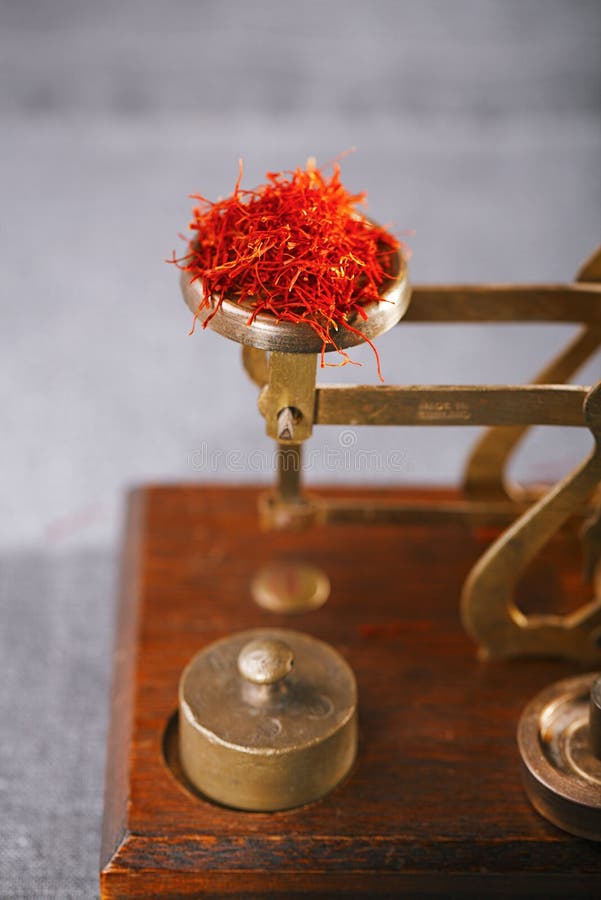 Saffron Treads with Vintage Postal Scale Stock Image - Image of golden ...