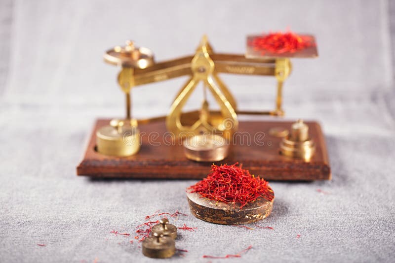 Saffron Treads with Vintage Postal Scale Stock Photo - Image of flower ...