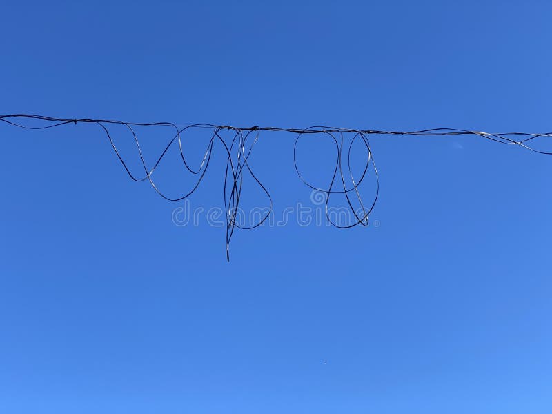 Sagging Wire Against the Blue Sky Stock Photo - Image of voltage ...