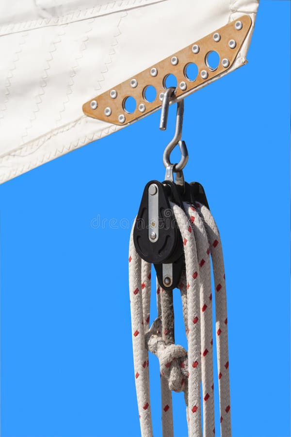 Sail and Block on a Background of Blue Sky Stock Photo - Image of ...