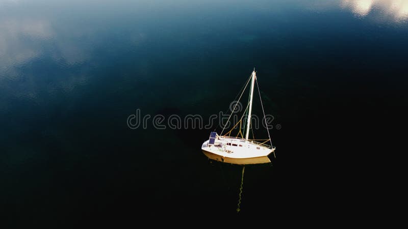 Sail Boat Alone on the See. Stock Photo - Image of alone, reflection ...