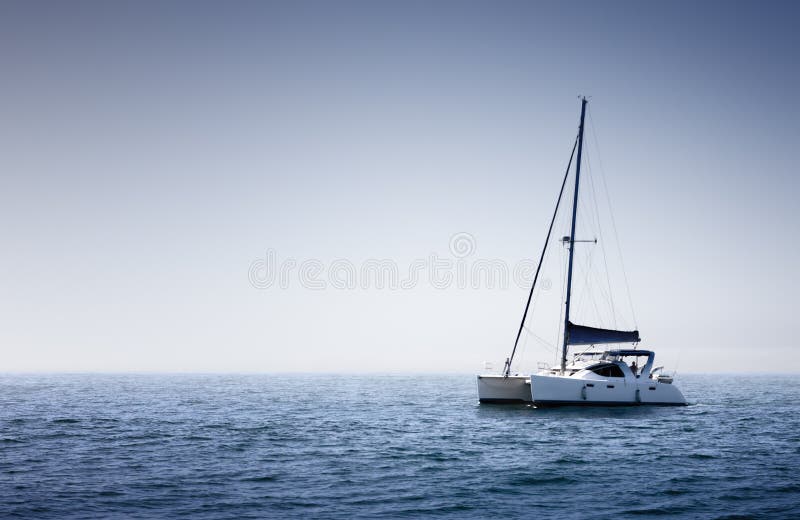 Sailboat on blue water stock image. Image of peaceful - 3075373