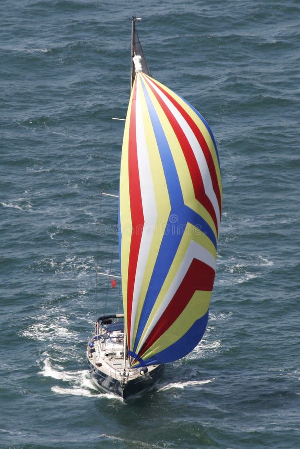 Sail boat with spinnaker stock photo. Image of journey - 9562550