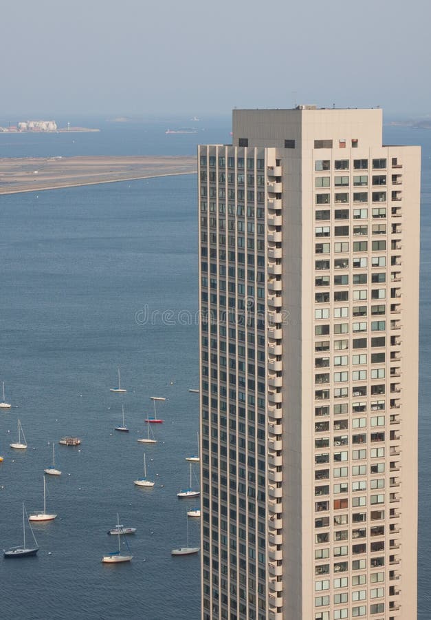 Sail Boats Parked Outside Tall Building Stock Photo - Image of harbor ...