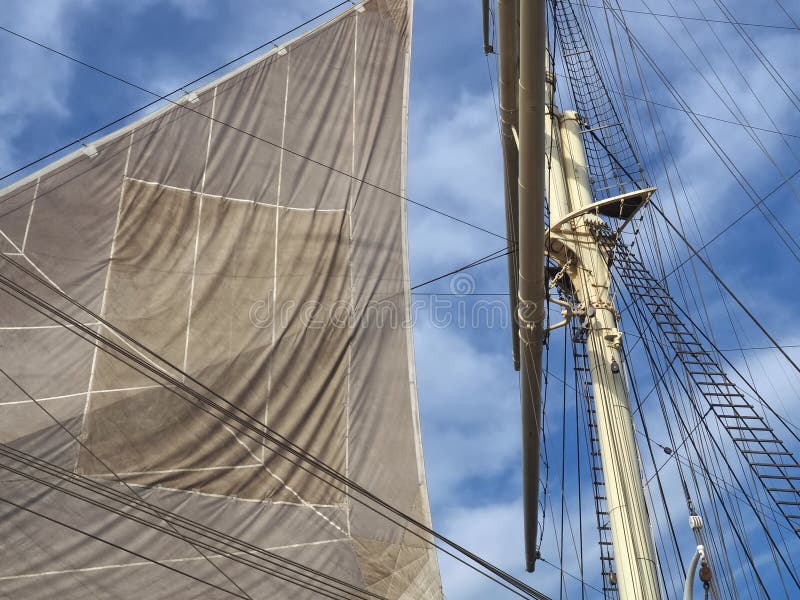 Closeup of Sails and Ropes of a Sailing Ship with Blue Sky Stock Image ...