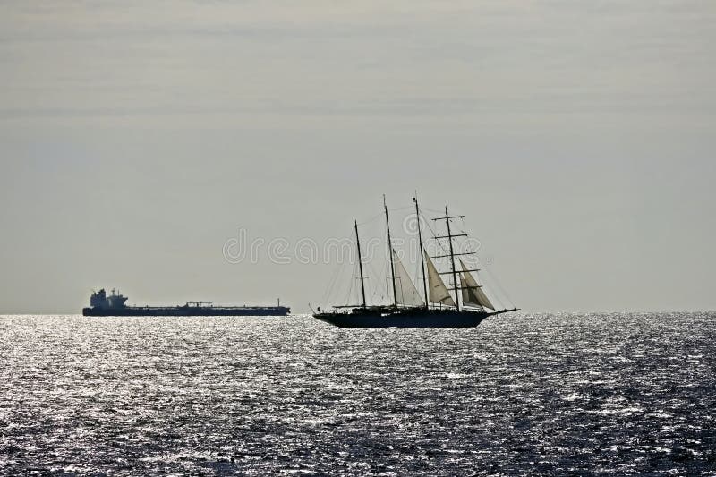 Sail Ship and Yachts Performs Maneuvers at Open Sea and Entering into the Port . Stock Photo ...