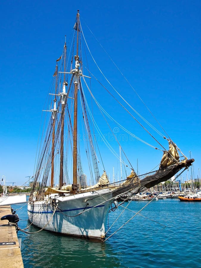 Sailboat Anchored at Barcelona Stock Photo - Image of commercial, pier ...