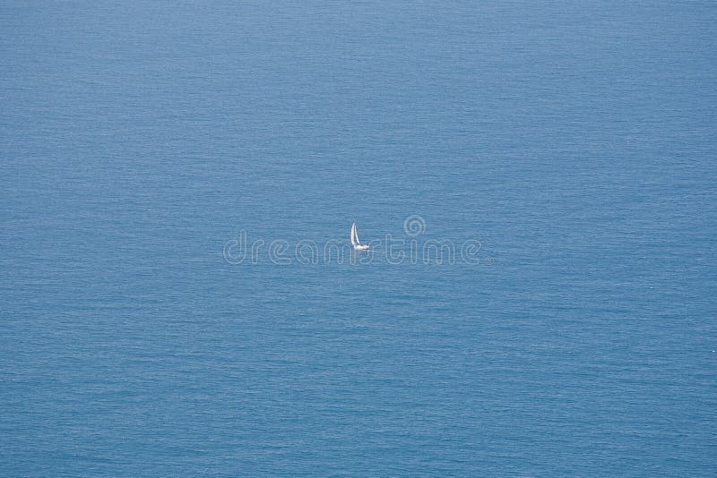 Sailboat and Boundless Ocean Stock Image - Image of background, lonely ...