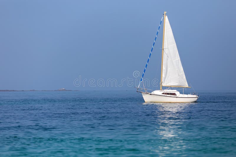 Sailboat on calm sea stock image. Image of recreational - 45237105