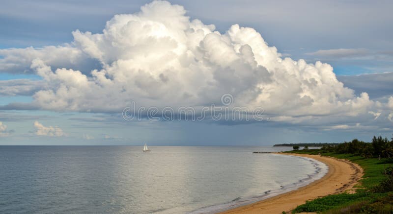 Sailboat on Calm Tropical Ocean Under Large White Clouds Stock ...