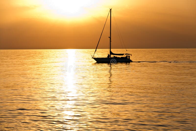 Sailboat at dawn stock photo. Image of light, calm, holiday - 19124890