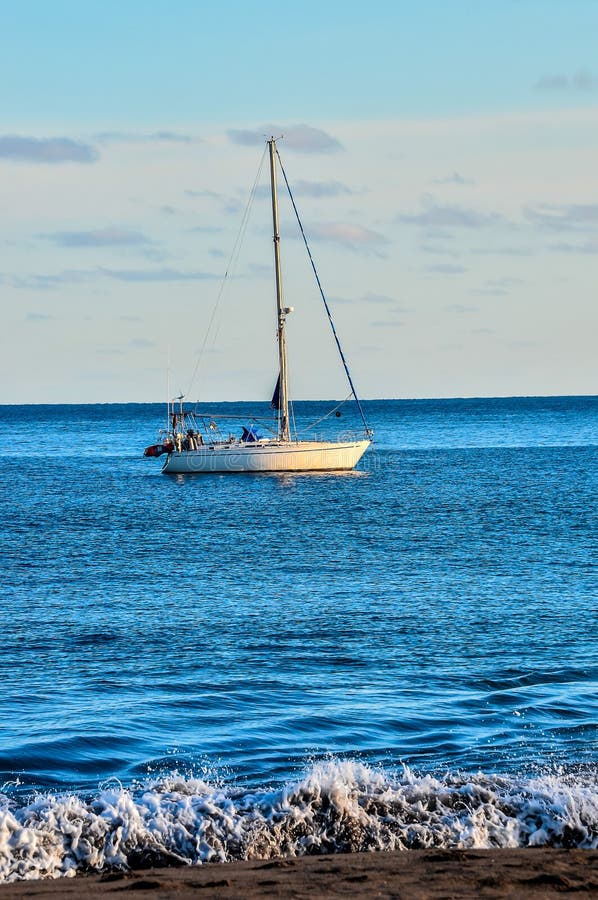 A Sailboat is Floating on the Ocean Stock Image - Image of blue ...