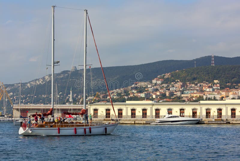 Sailboat in Front of Trieste Port Editorial Stock Photo - Image of ...
