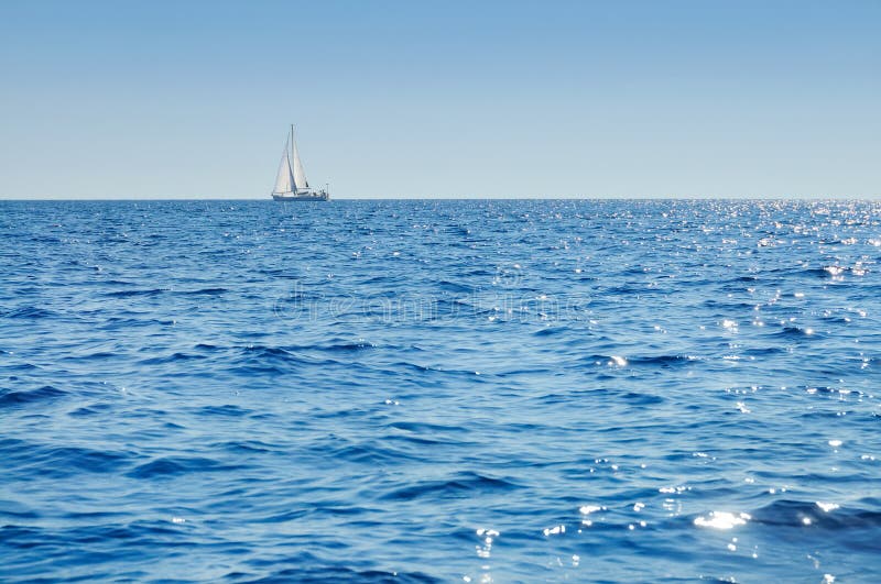 Sailboat at horizon stock photo. Image of blue, travel - 33745444