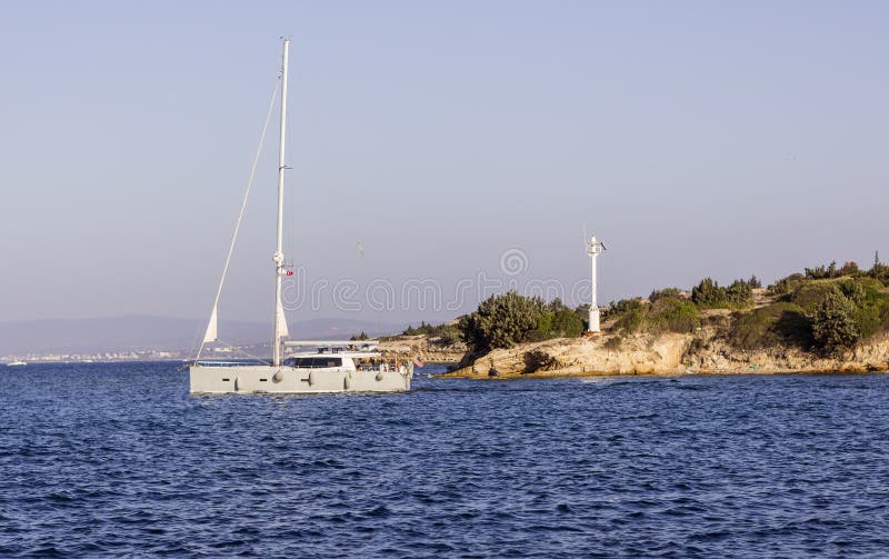 Sailboat and lighthouse stock image. Image of sails, teamwork - 16778921