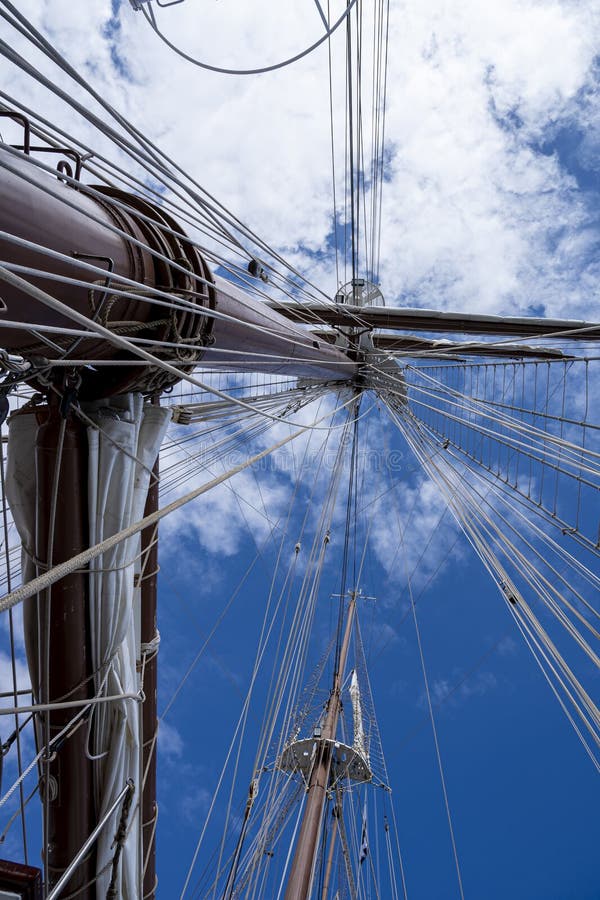 A Sailboat with a Mast and a Blue Sky in the Background. Stock Photo ...