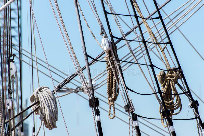 Sailboat Masts, Rigging and Rolled Up Sails Stock Photo - Image of ship ...