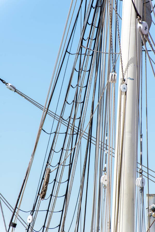 Sailboat Masts, Rigging and Rolled Up Sails Stock Image - Image of ...