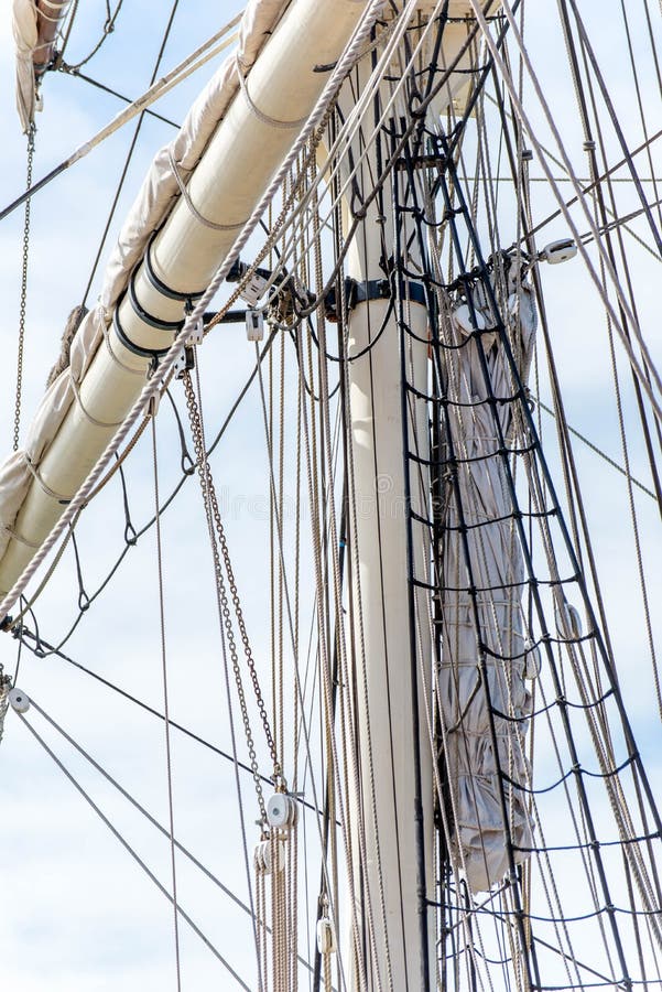 Sailboat Masts, Rigging and Rolled Up Sails Stock Image - Image of ...
