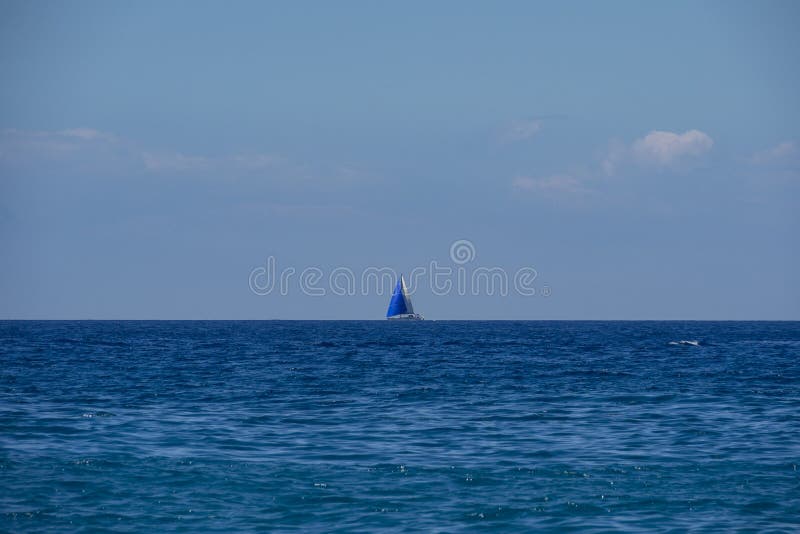 Sailboat in the Middle of the Sea Stock Photo - Image of nautical ...