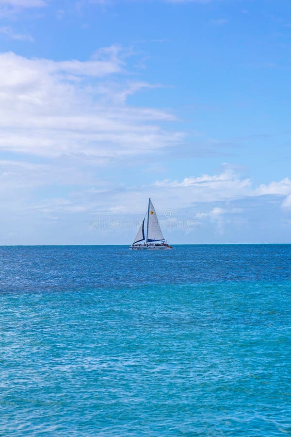 Sailboat Navigating a Tranquil Blue Ocean Stock Photo - Image of ...