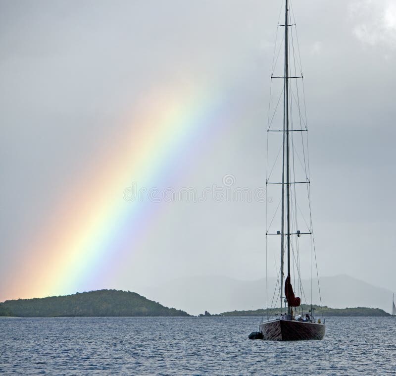 Sailboat Rainbow.Sailboat Sail Off into the Sunset on Lake. Stock Image ...