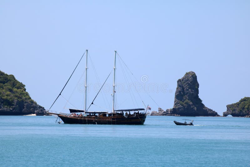 Sailboat Sailing between Islands. Stock Photo - Image of archipelago ...