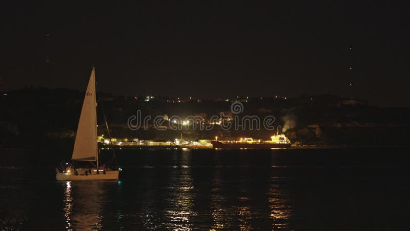Sailboat Sailing on Water at Night Stock Video - Video of waves ...