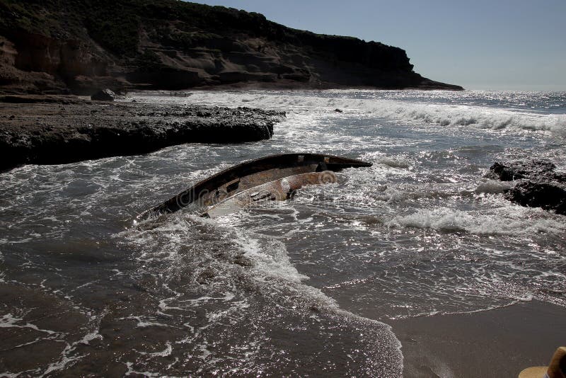 Sailboat Stranded on the Beach after a Storm Stock Image - Image of ...