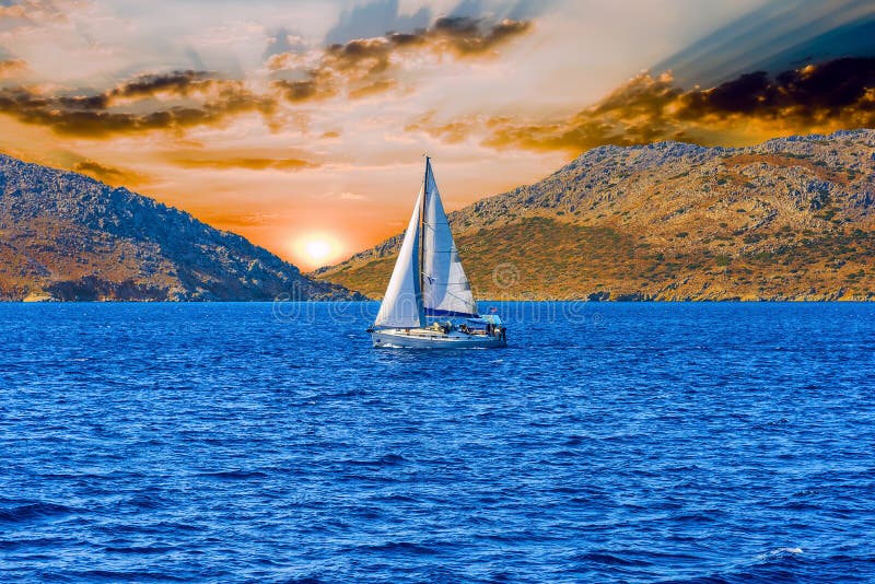 Sailboat at sunset stock image. Image of mast, boat, summer - 34870143