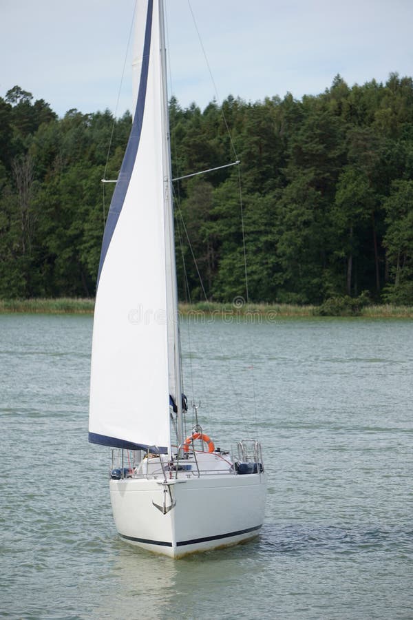 Sailboat Swimming on a Lake - Front View Stock Image - Image of tourism ...