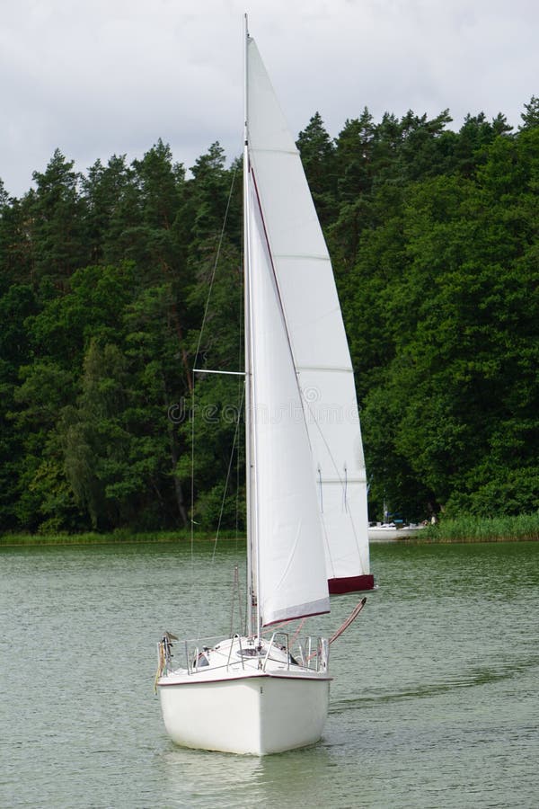 Sailboat Swimming on a Lake - Front View Stock Image - Image of masuria ...