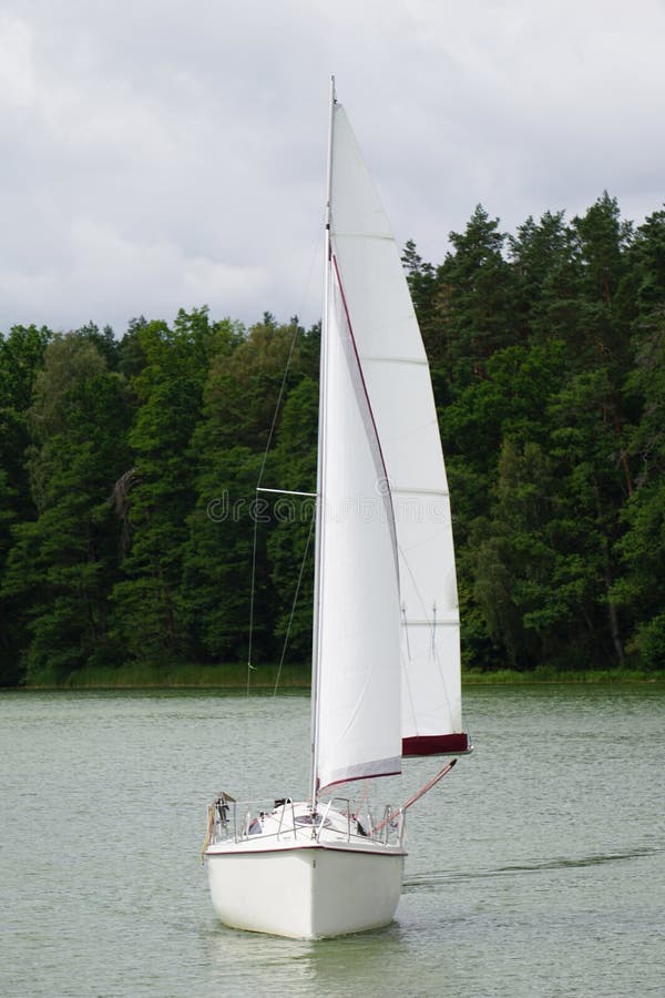 Sailboat Swimming on a Lake - Front View Stock Photo - Image of nature ...